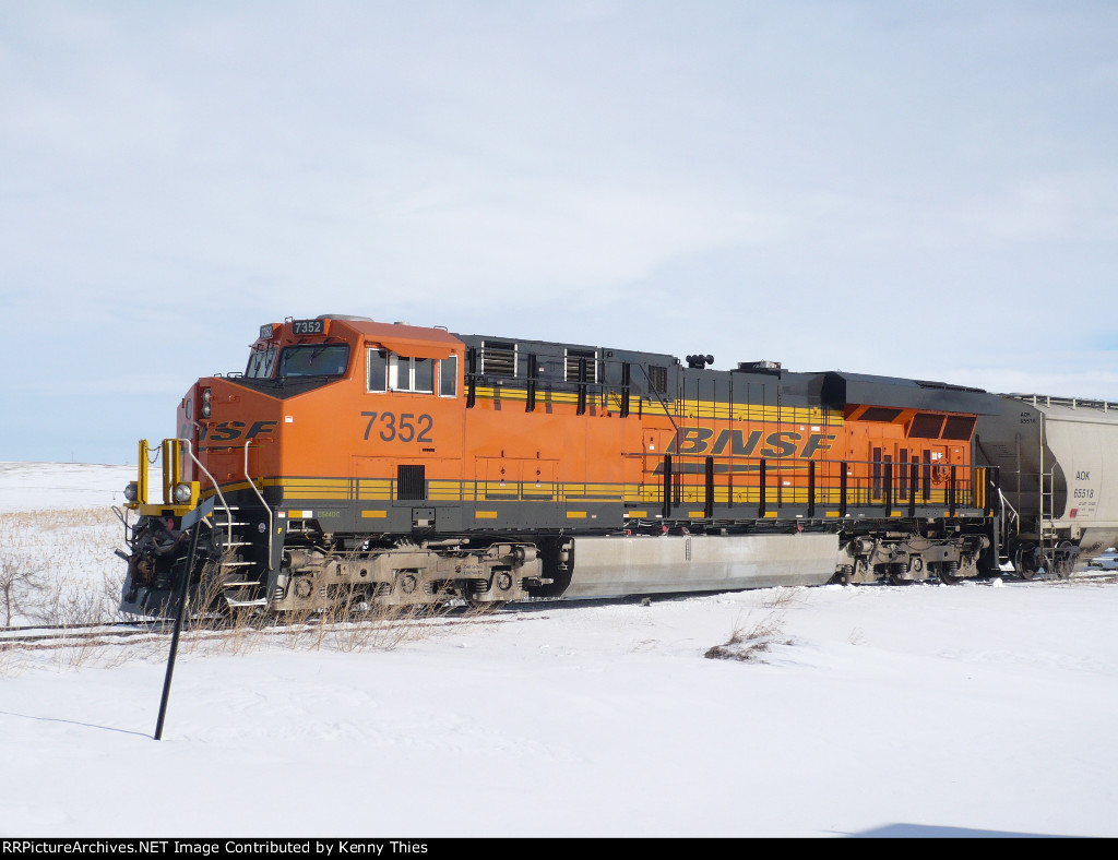 BNSF 7352 is the DPU on a grain train